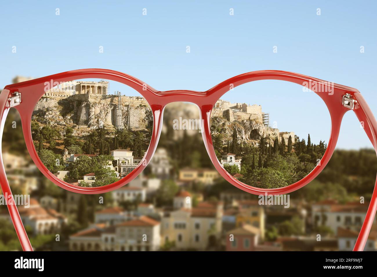 Vision correction. Landscape becoming clearer when looking through ...