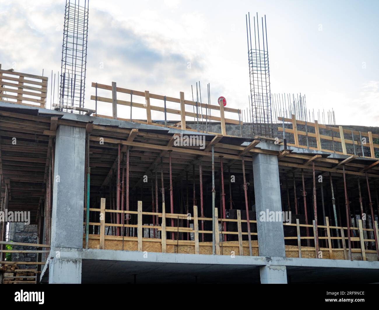 Construction of a new floor. Building a house. Installation of walls ...
