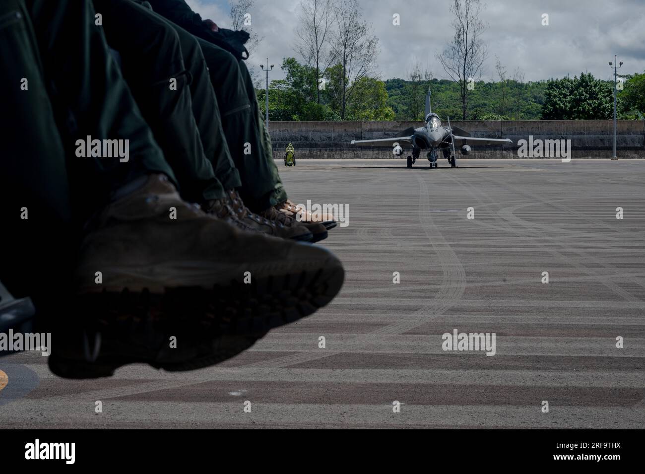 French Air Force loadmasters sit on the ramp of a FAF Airbus A400 Atlas ...