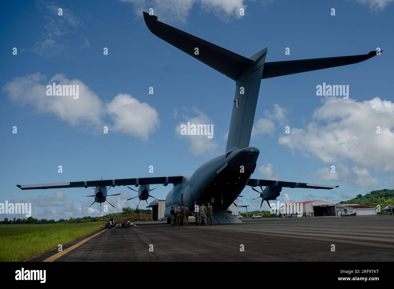 A French Air Force Airbus A400 Atlas preps to load members from a U.K ...