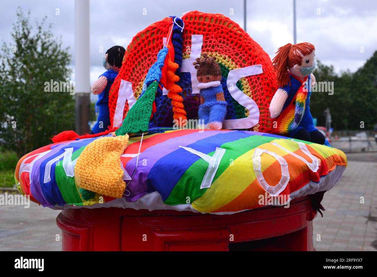 Royal Mail post box, decorated on top knitted NHS sign yarn bombing ...