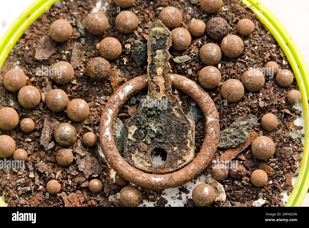 old rusted brown colored iron pieces and dust Stock Photo - Alamy