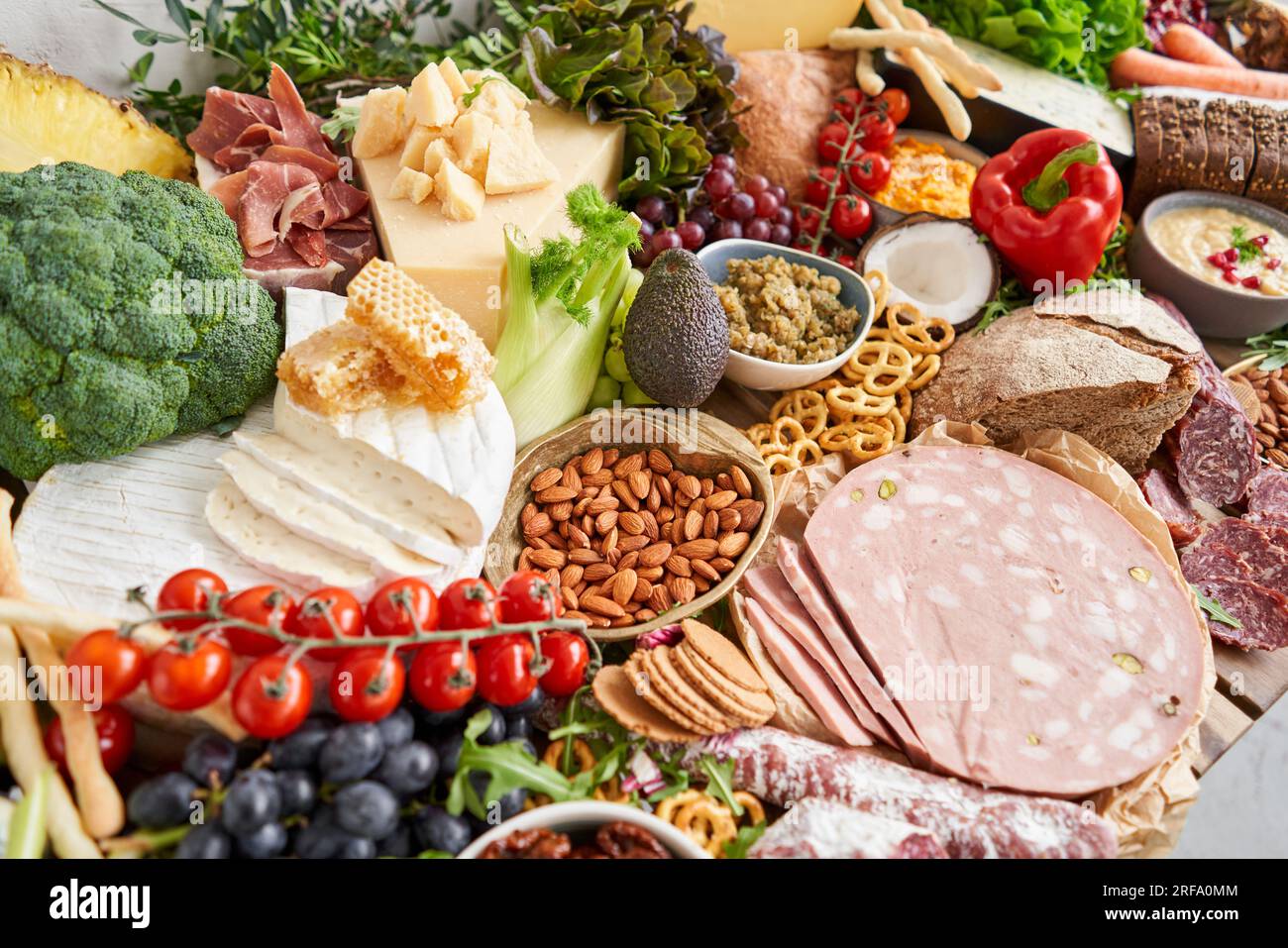 Fresh bread, pastries. Table full of mediterranean appetizers, tapas or ...