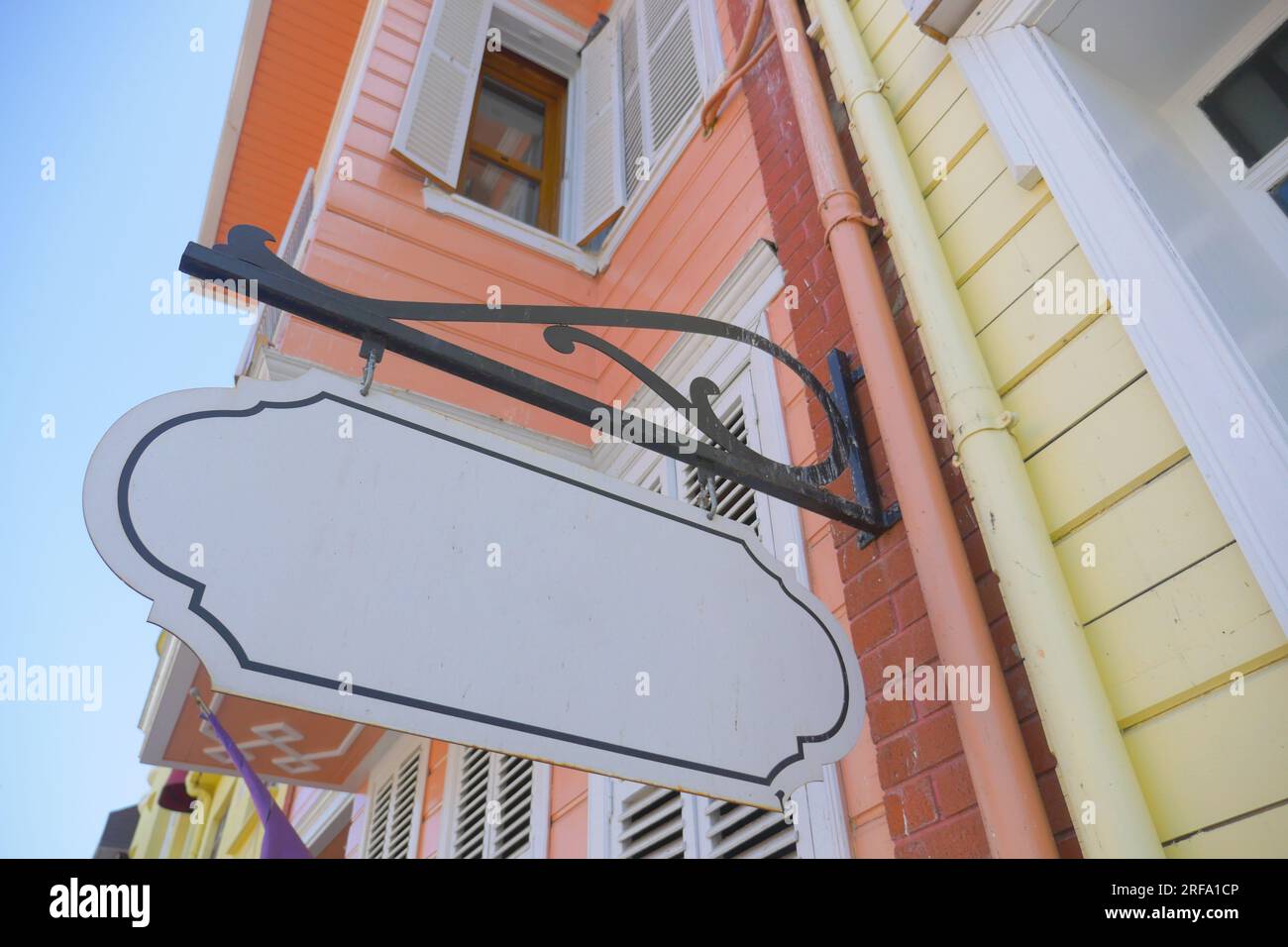 Street signboard mockup on modern city building Stock Photo - Alamy