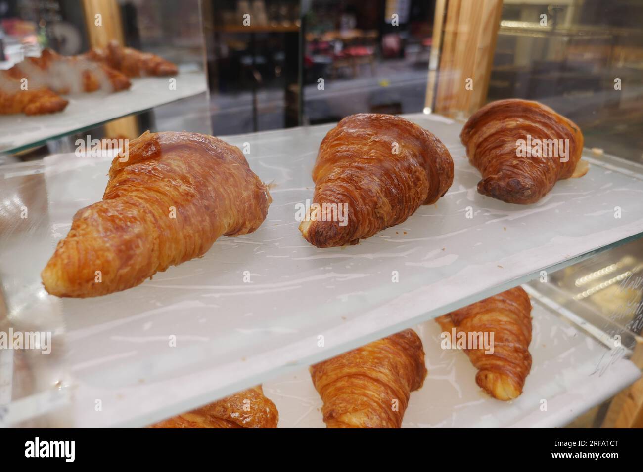 Croissant cake freshly baked in shelf Stock Photo - Alamy