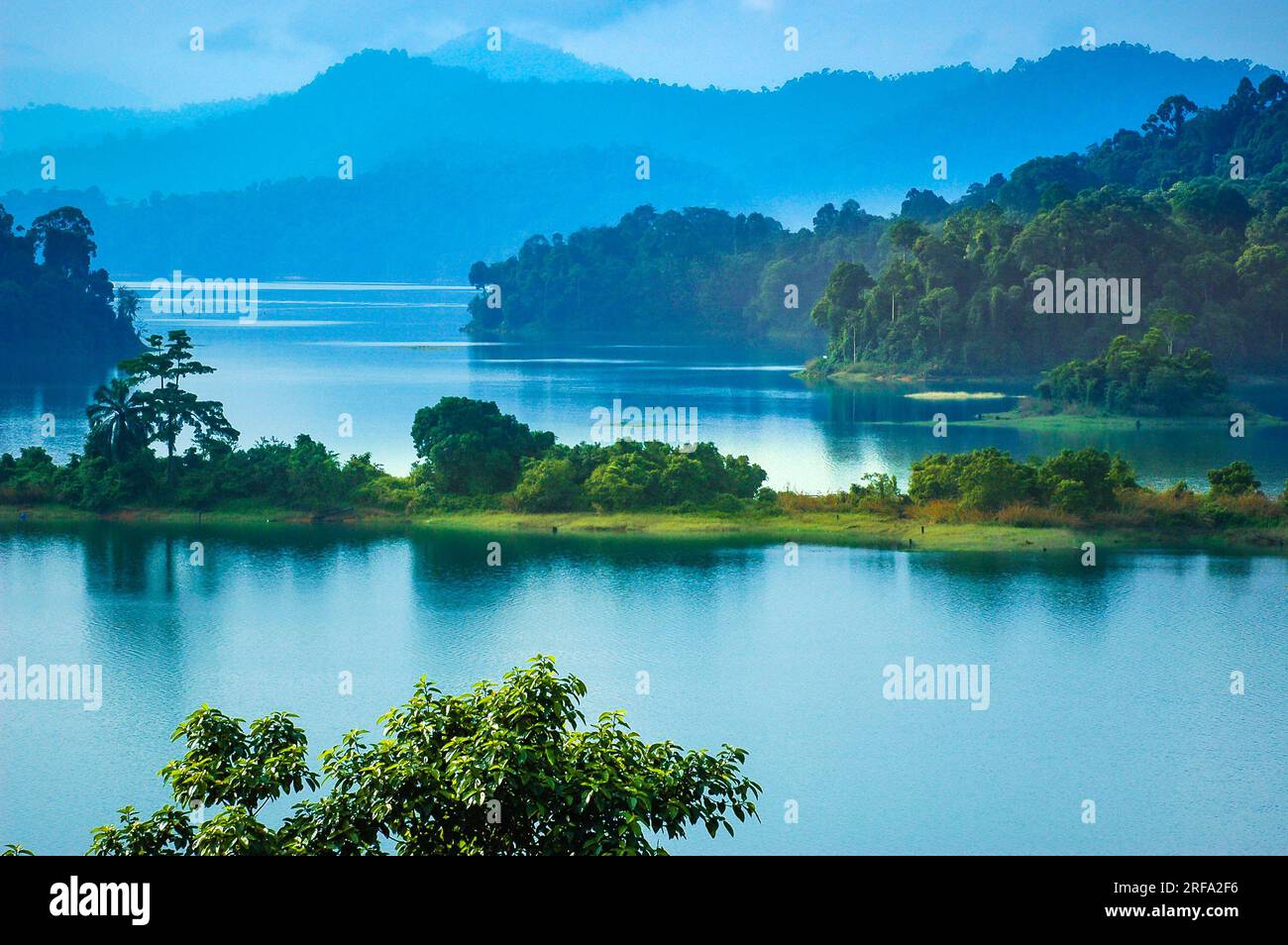 A stunning blue water of Kenyir Lake scenery with hilly area in the ...