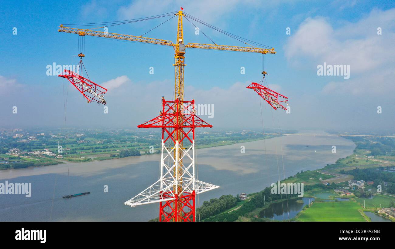 YANGZHOU, CHINA - AUGUST 2, 2023 - Construction workers assemble a ...