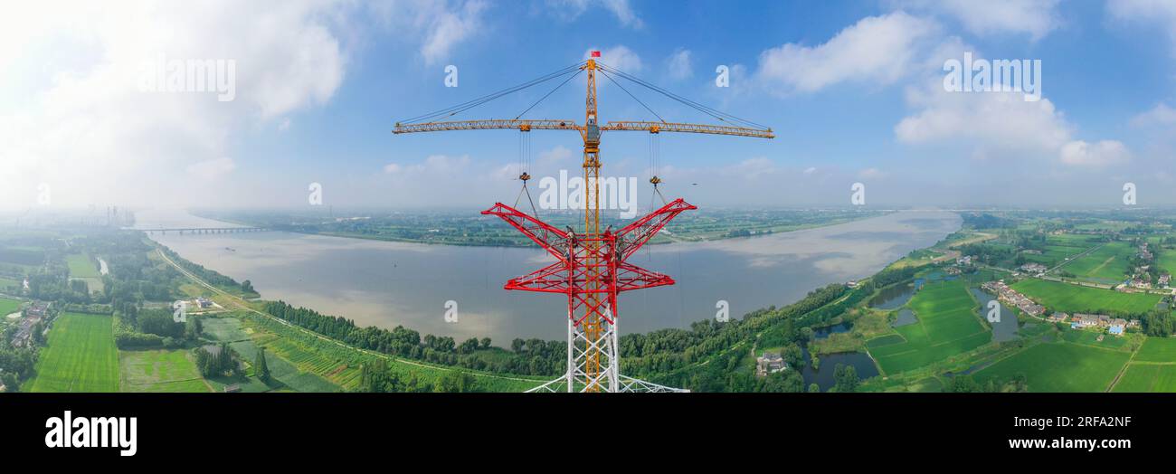 YANGZHOU, CHINA - AUGUST 2, 2023 - Construction workers assemble a ...