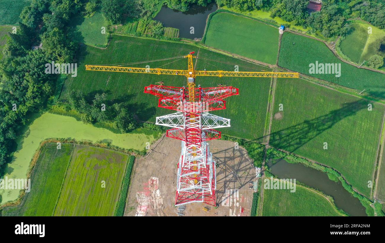 YANGZHOU, CHINA - AUGUST 2, 2023 - Construction workers assemble a ...