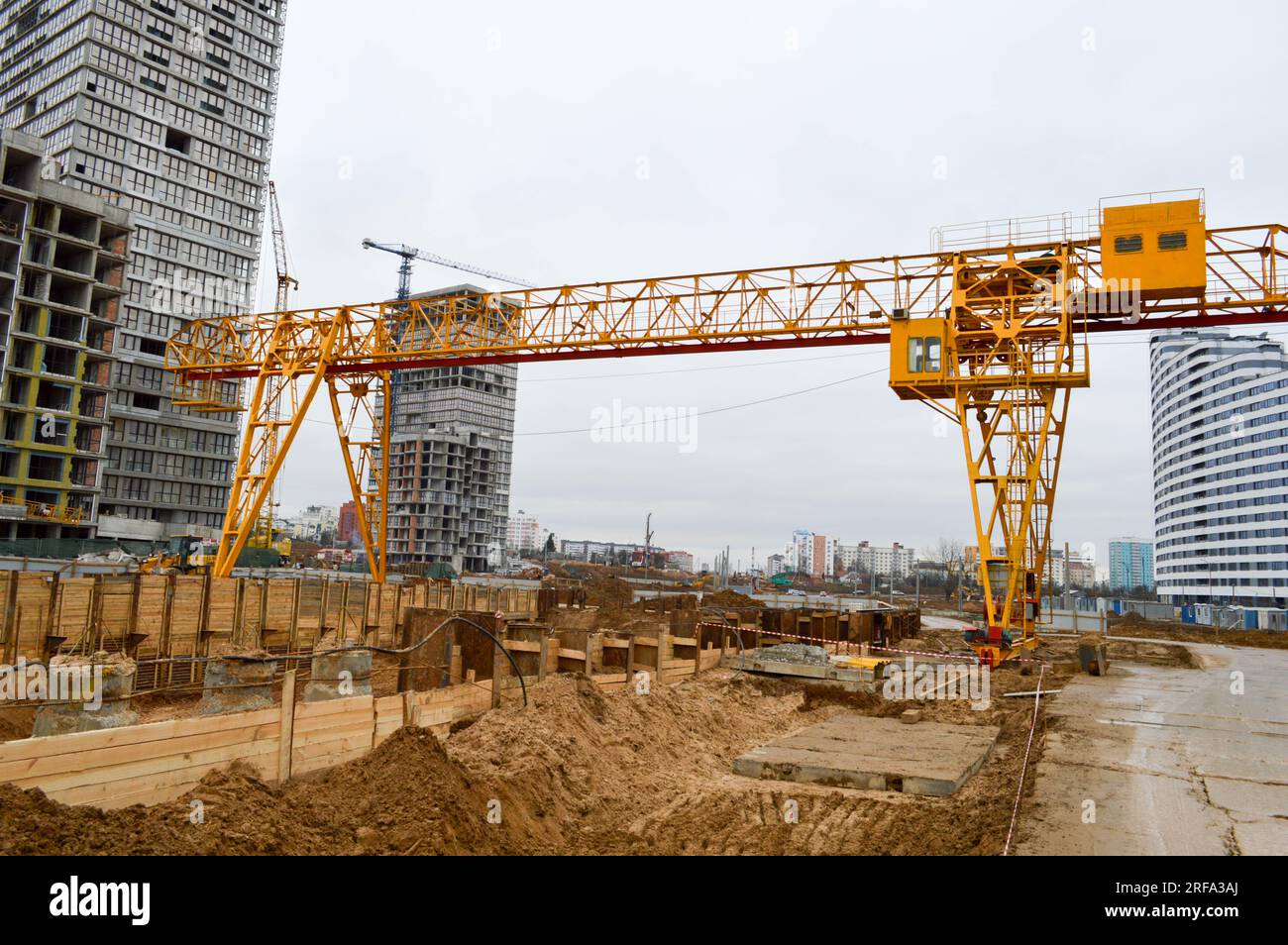 A large modern construction site in the construction of buildings and ...