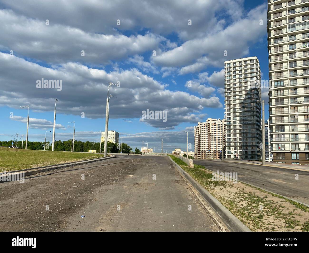 A large construction site of new tall large houses of concrete ...