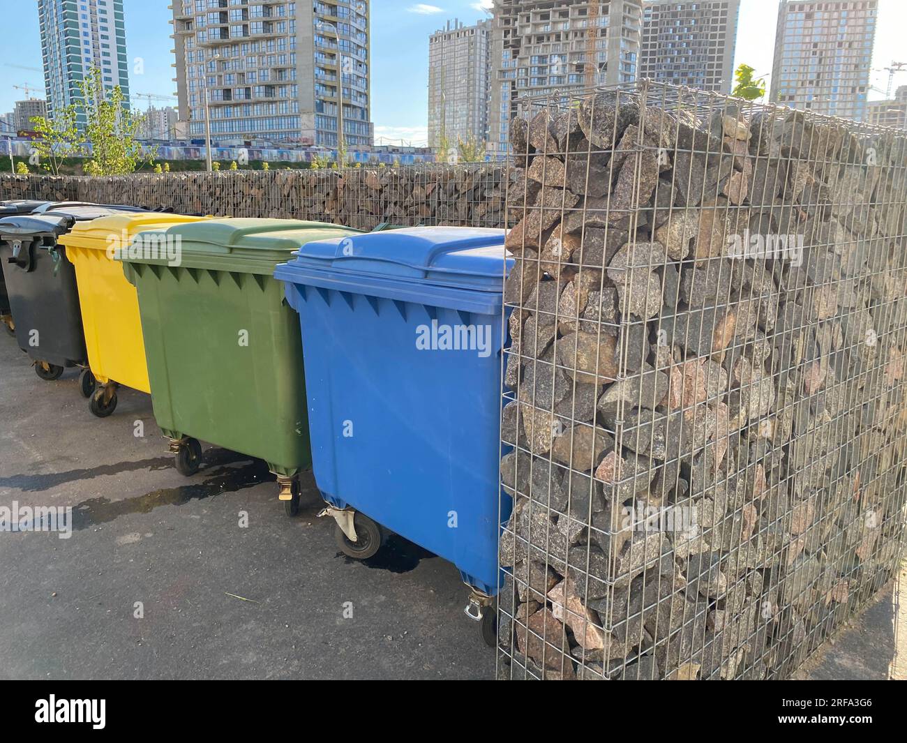 Multi-colored plastic containers for separate waste collection Stock ...