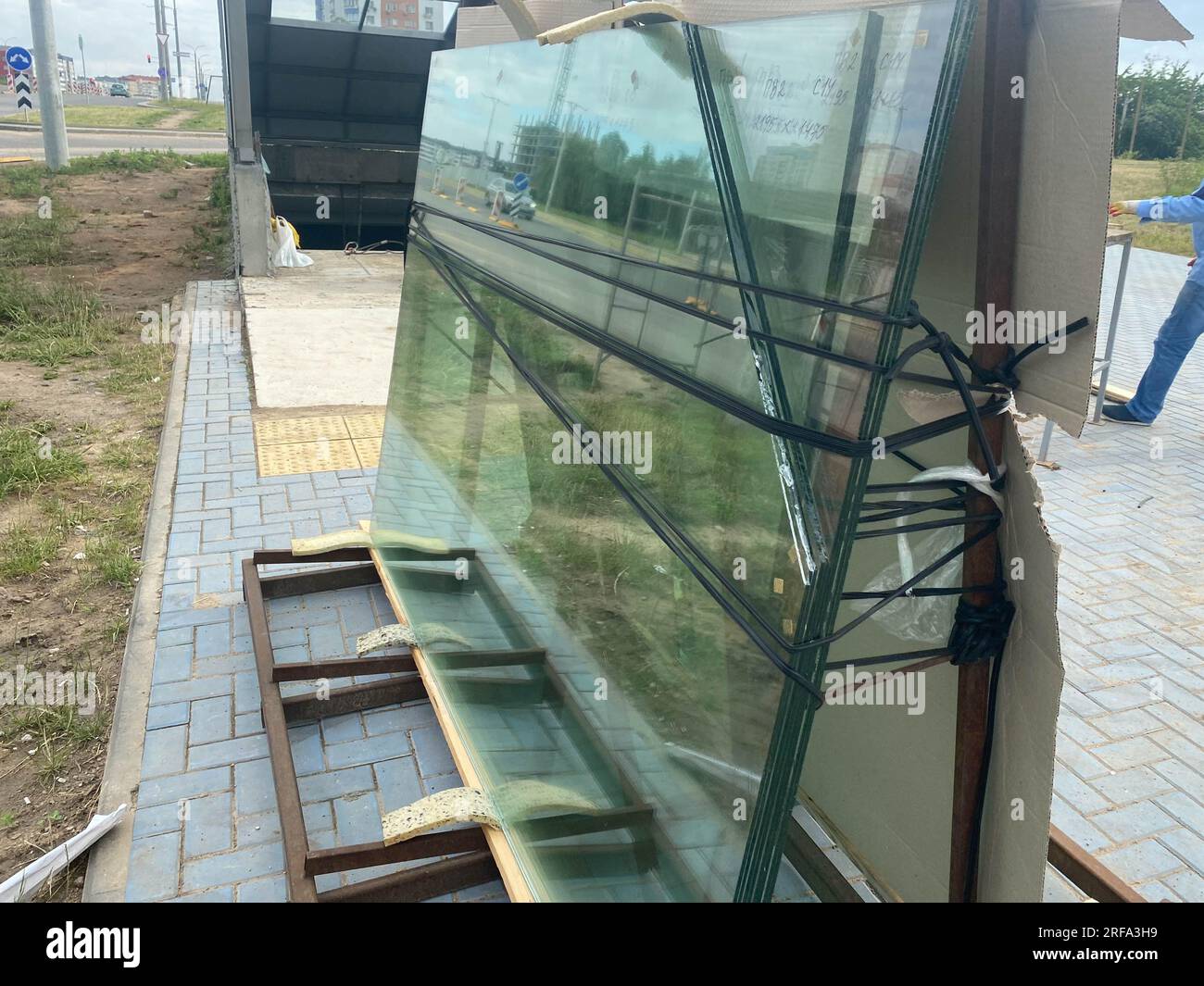 Large industrial building heavy duty thick glass panes are being ...