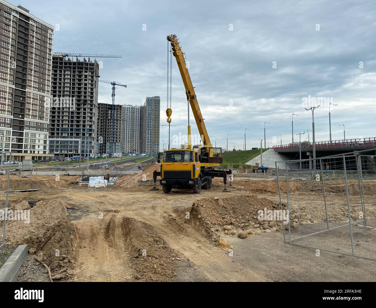 Large yellow mobility modern industrial construction crane mounted on a ...