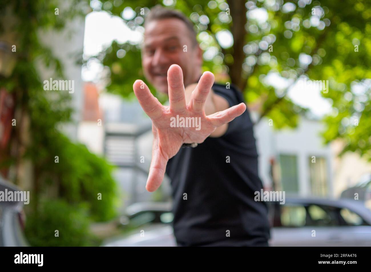 Hand Reaching Towards Camera