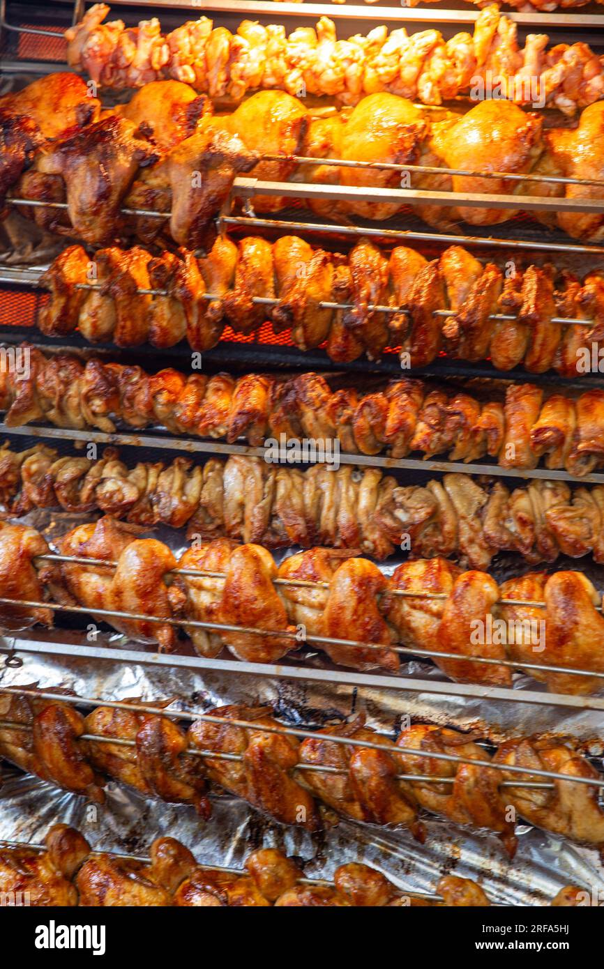 Rotating grilling chicken on hi-res stock photography and images - Alamy