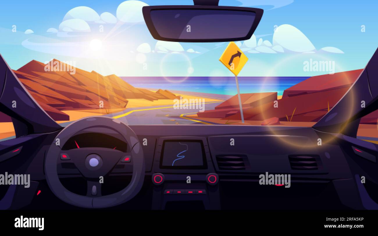 Inside car view on desert road to sea shore landscape. Turn sign on ...