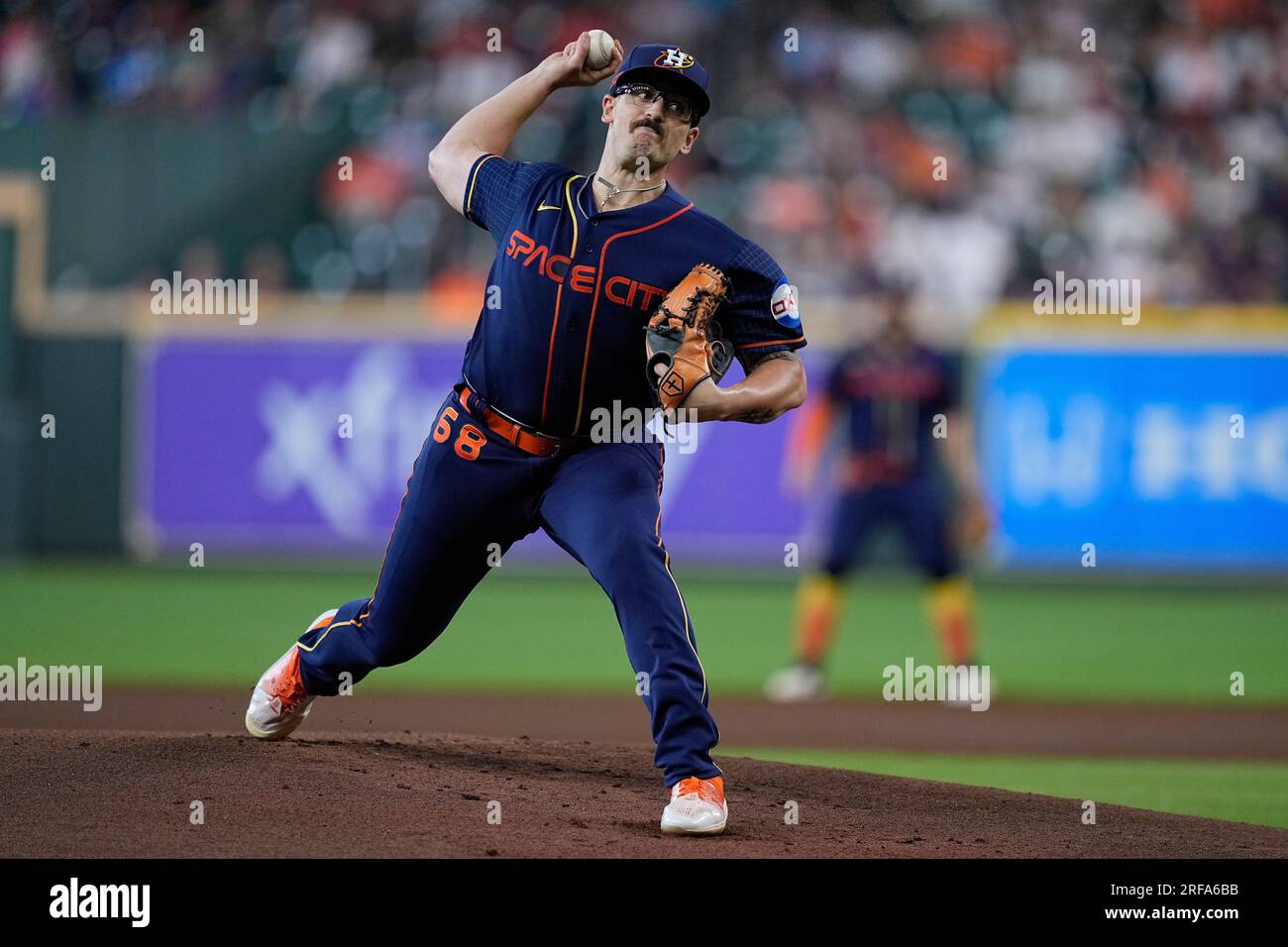 Houston Astros starting pitcher J.P. France delivers during the first ...