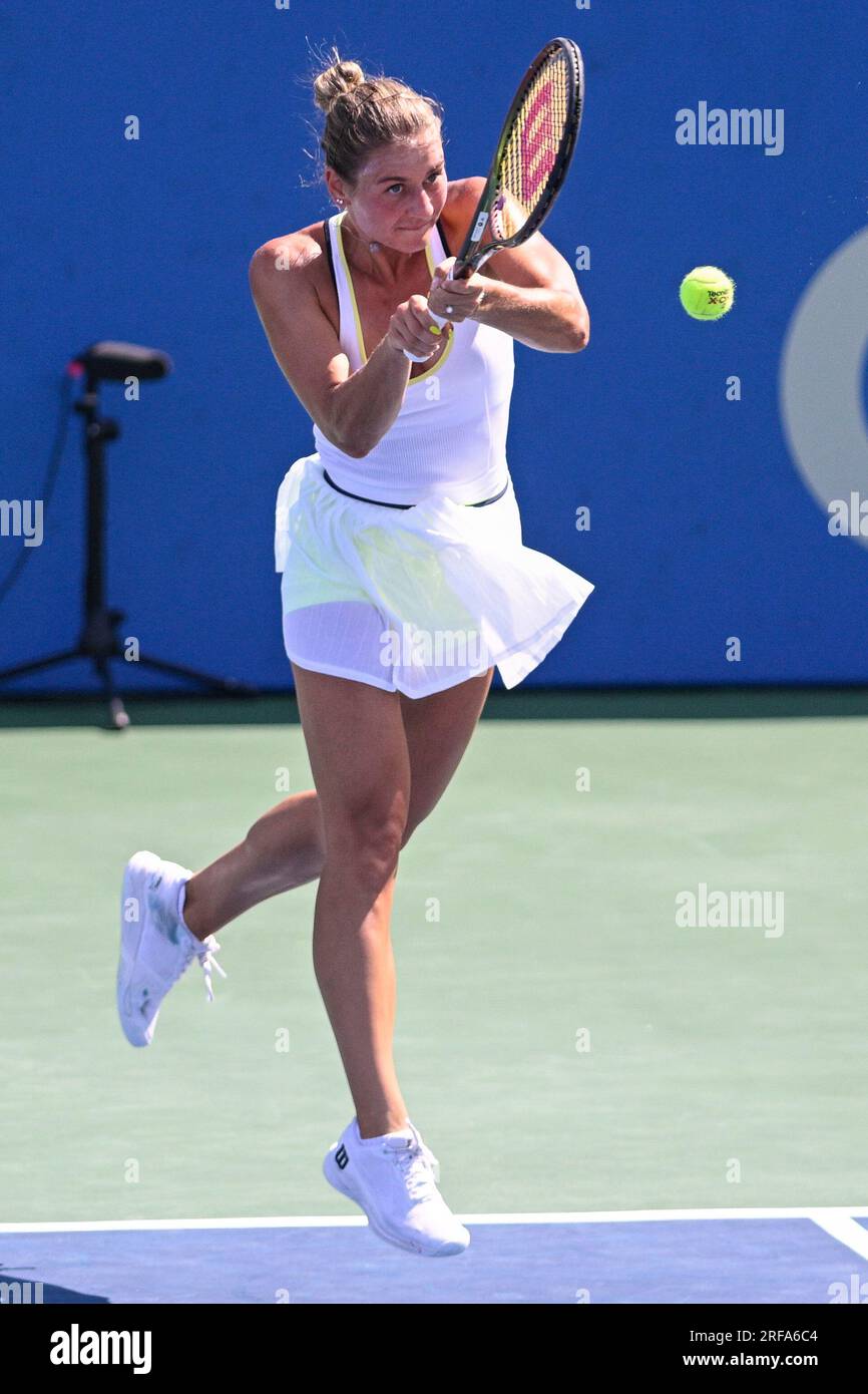 July 31, 2023, Washington, D.C, U.S: MARTA KOSTYUK hits a backhand ...