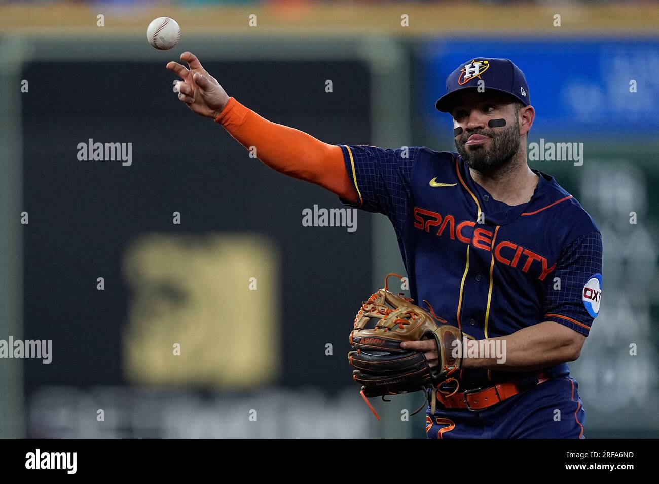 Houston Astros second baseman Jose Altuve fields a ground ball out from ...