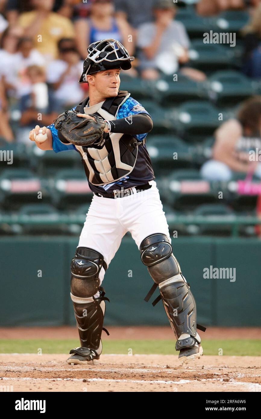 Hickory Crawdads catcher Cooper Johnson (20) throws during a South ...