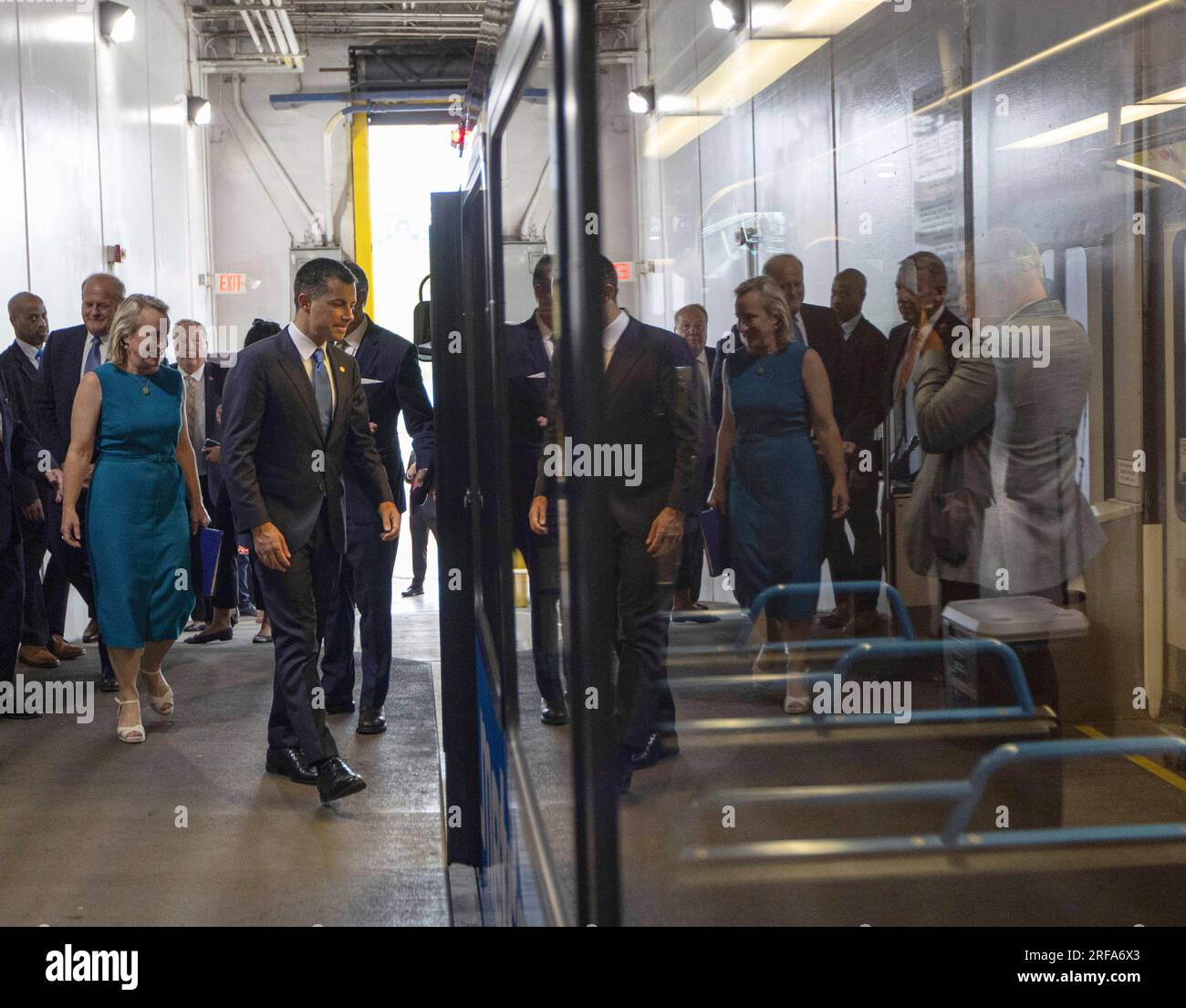 U.S. Transportation Secretary Pete Buttigieg boards the MetroLink at ...