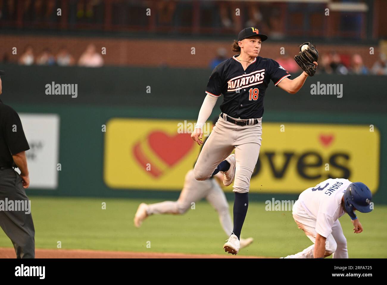 Second baseman Zack Gelof (18) of the Las Vegas Aviators leaps to catch ...