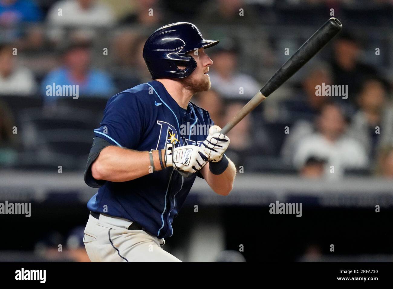 Tampa Bay Rays' Luke Raley follows through on a double during the ninth ...