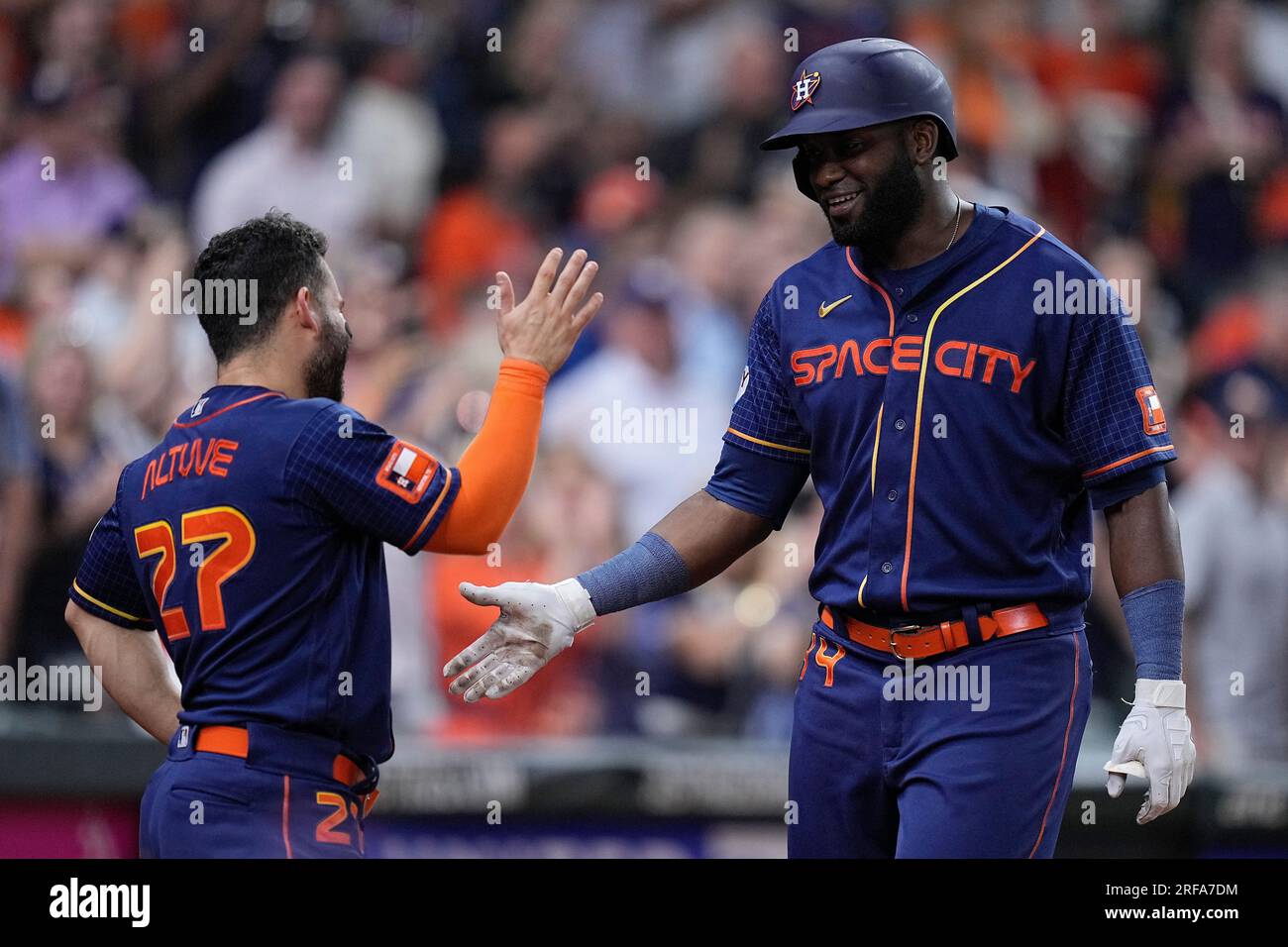 Houston Astros' Yordan Alvarez, right, celebrates with Jose Altuve (27 ...
