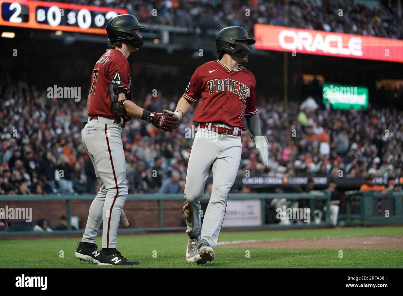 Arizona Diamondbacks' Corbin Carroll, right, celebrates with Jake ...