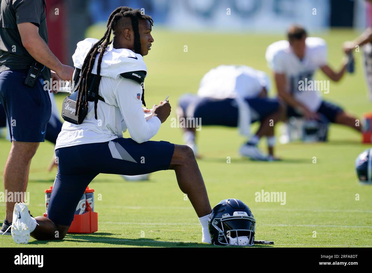 Tennessee Titans wide receiver DeAndre Hopkins stretches during an NFL football training camp ...