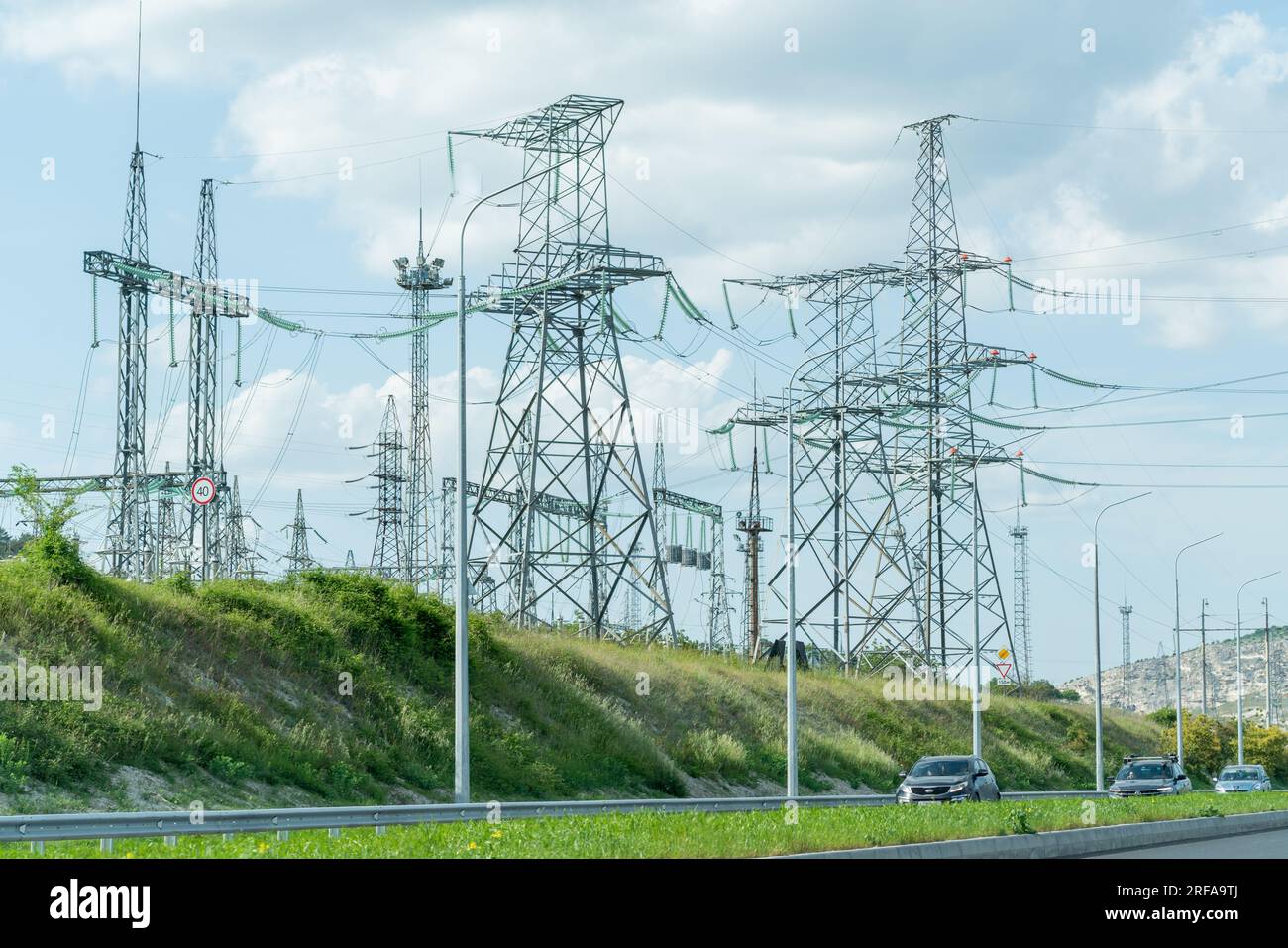 High voltage towers with sky background. Power line support with wires ...