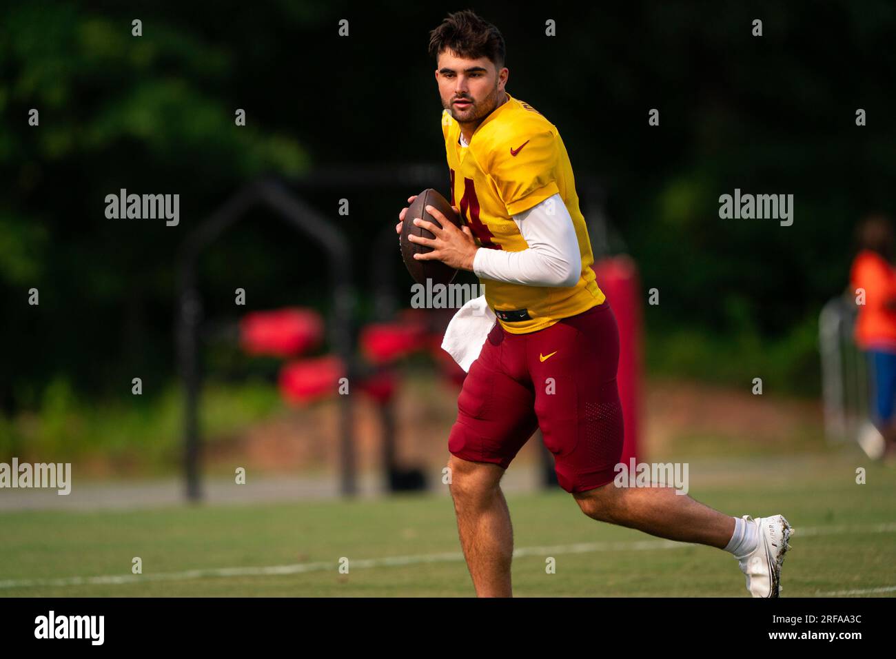 Washington Commanders quarterback Sam Howell participates in a drill ...