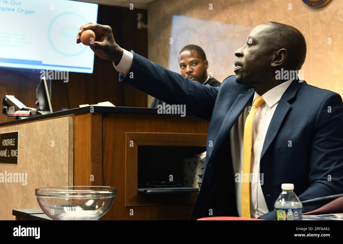 Dr. Colin King, uses an egg to demonstrate the softness of brain tissue ...