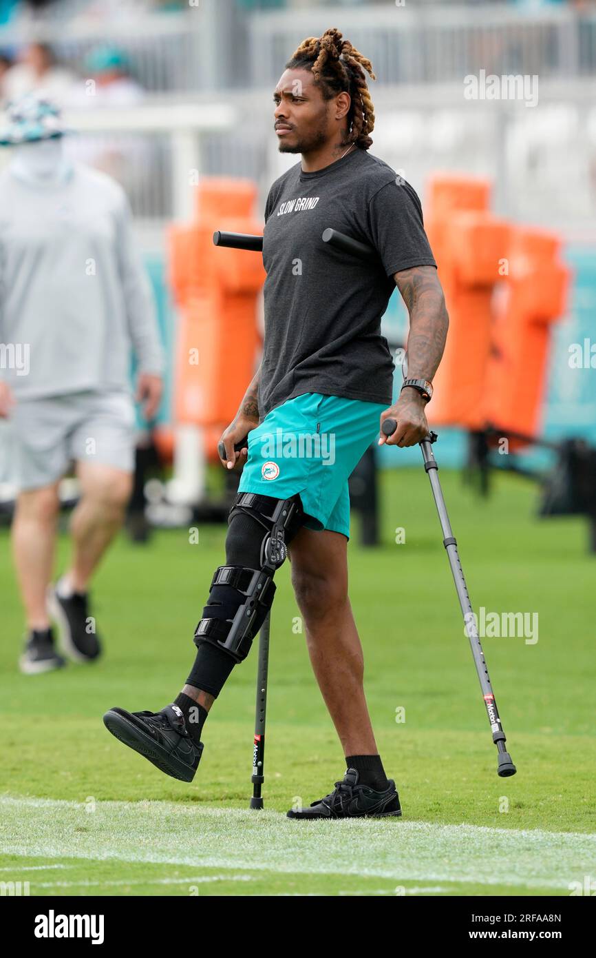 Miami Dolphins cornerback Jalen Ramsey stands on crutches during ...