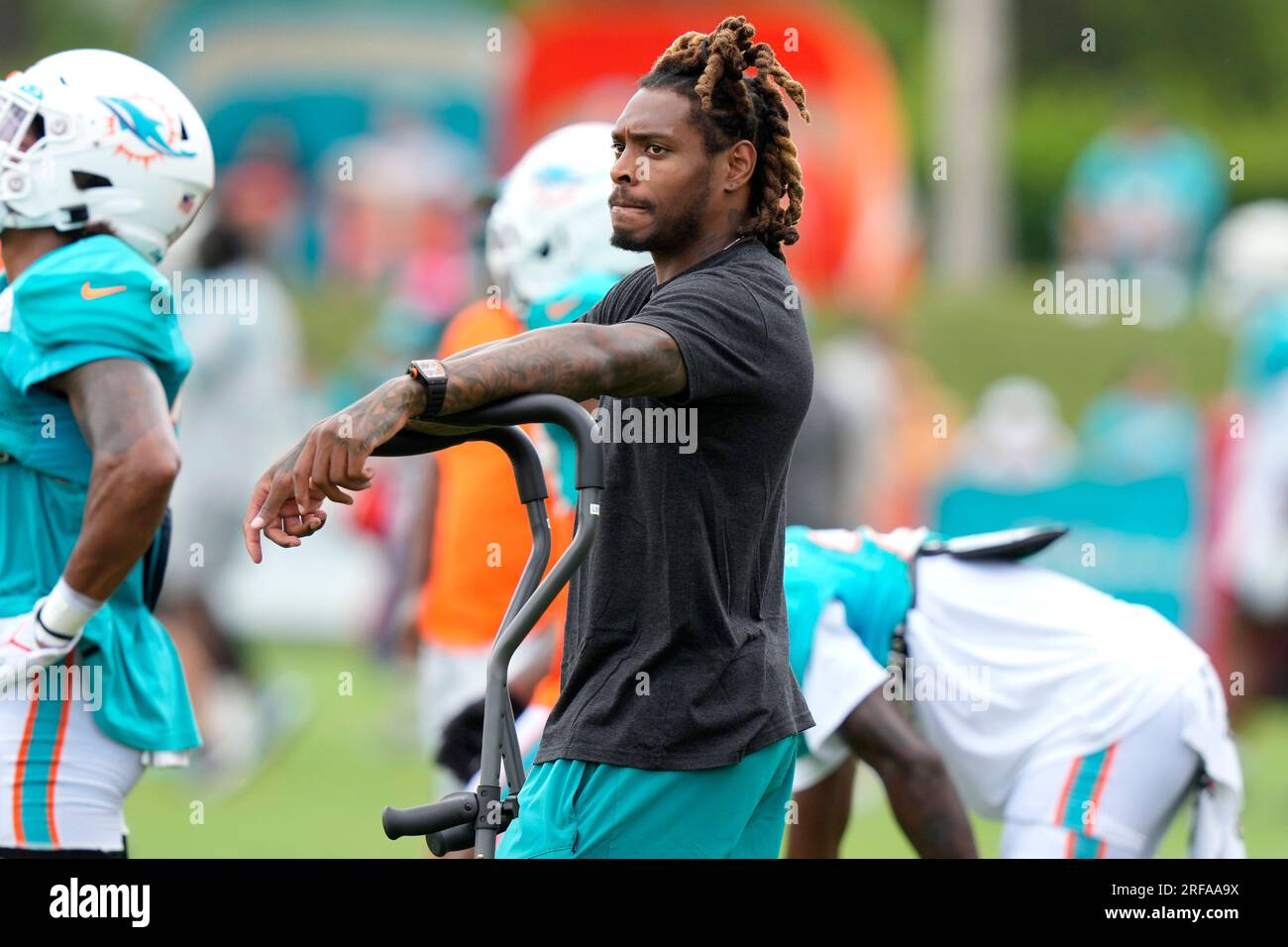 Miami Dolphins cornerback Jalen Ramsey stands on crutches during ...
