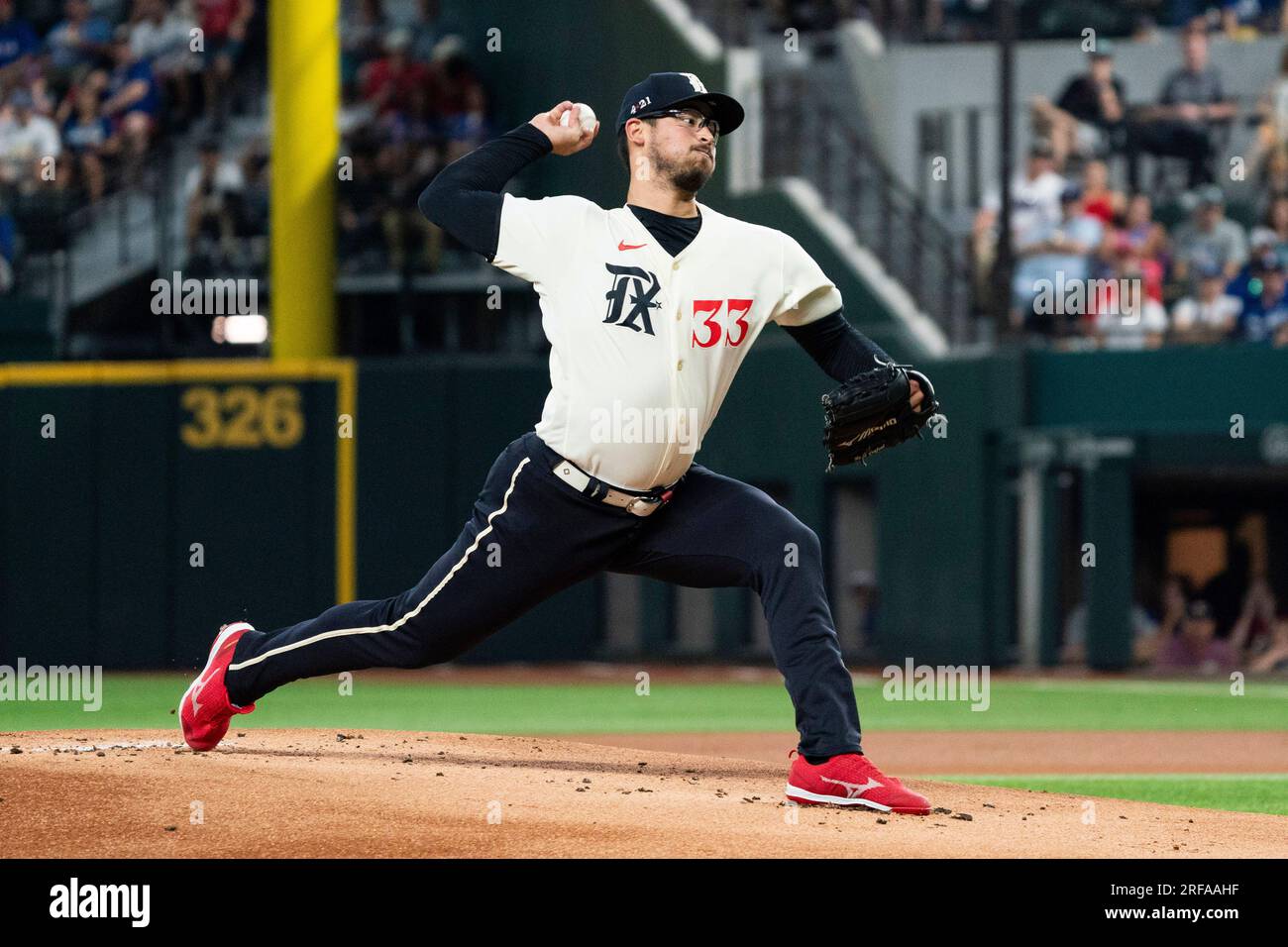 Texas Rangers starting pitcher Dane Dunning works against the Los ...