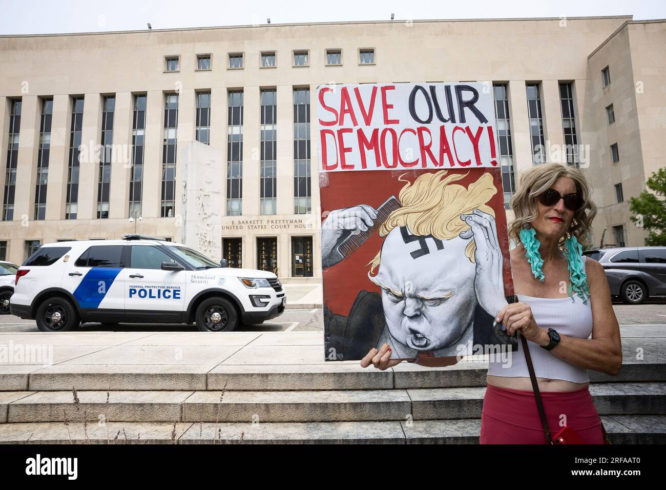 Nicky Sundt of Washington, D.C. demonstrates outside the E. Barrett ...