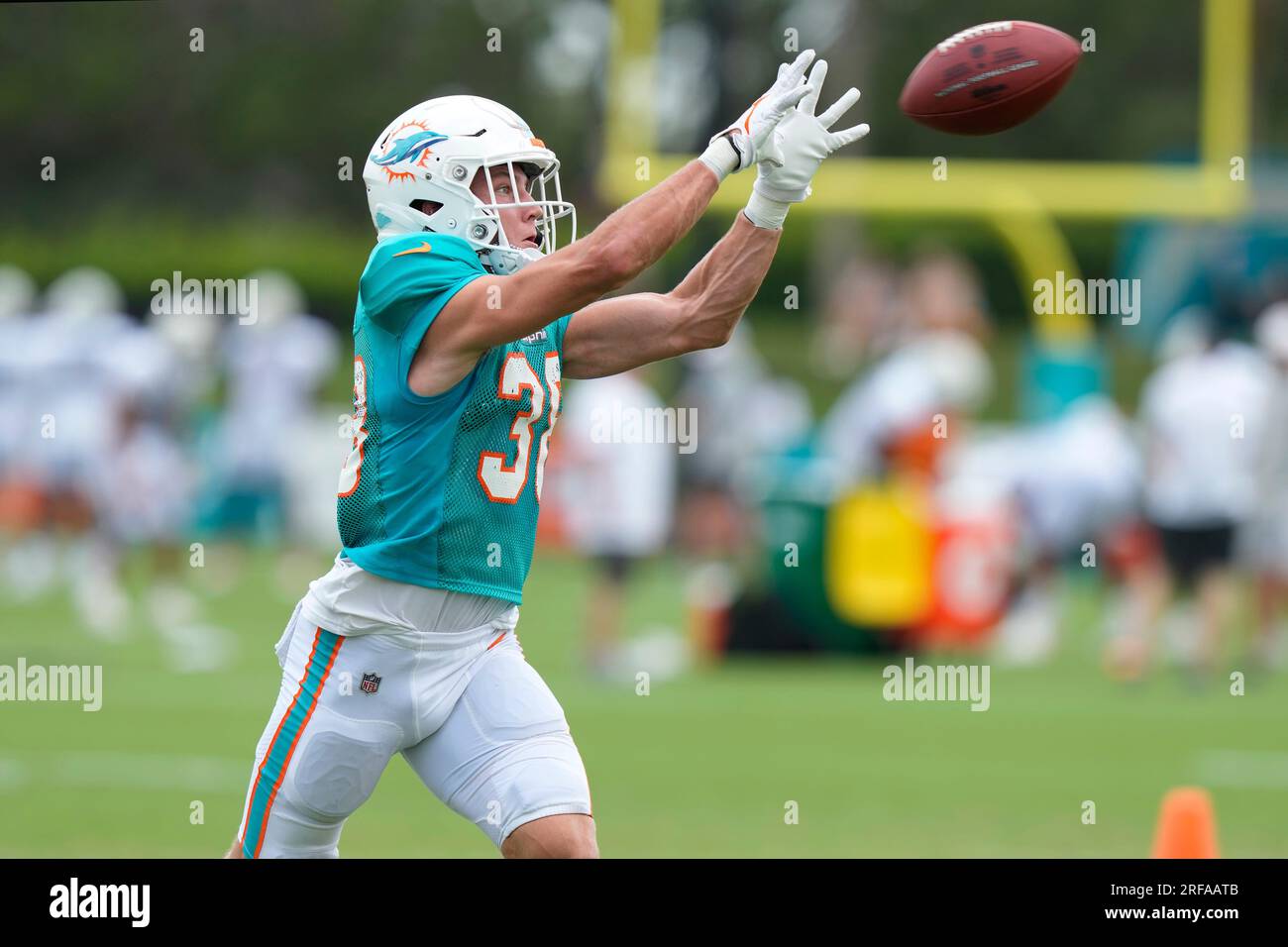 Miami Dolphins cornerback Ethan Bonner runs drills during practice at ...