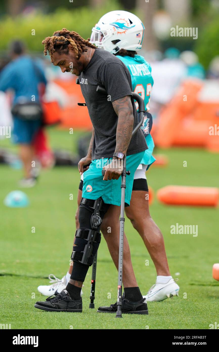 Miami Dolphins cornerback Jalen Ramsey stands on crutches during ...
