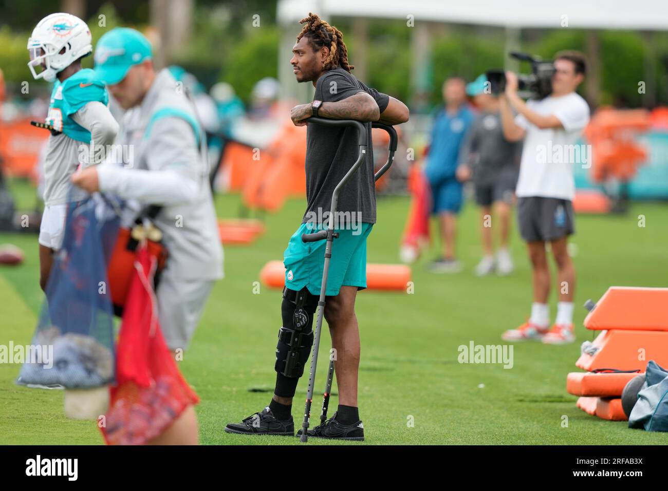 Miami Dolphins cornerback Jalen Ramsey stands on crutches during ...