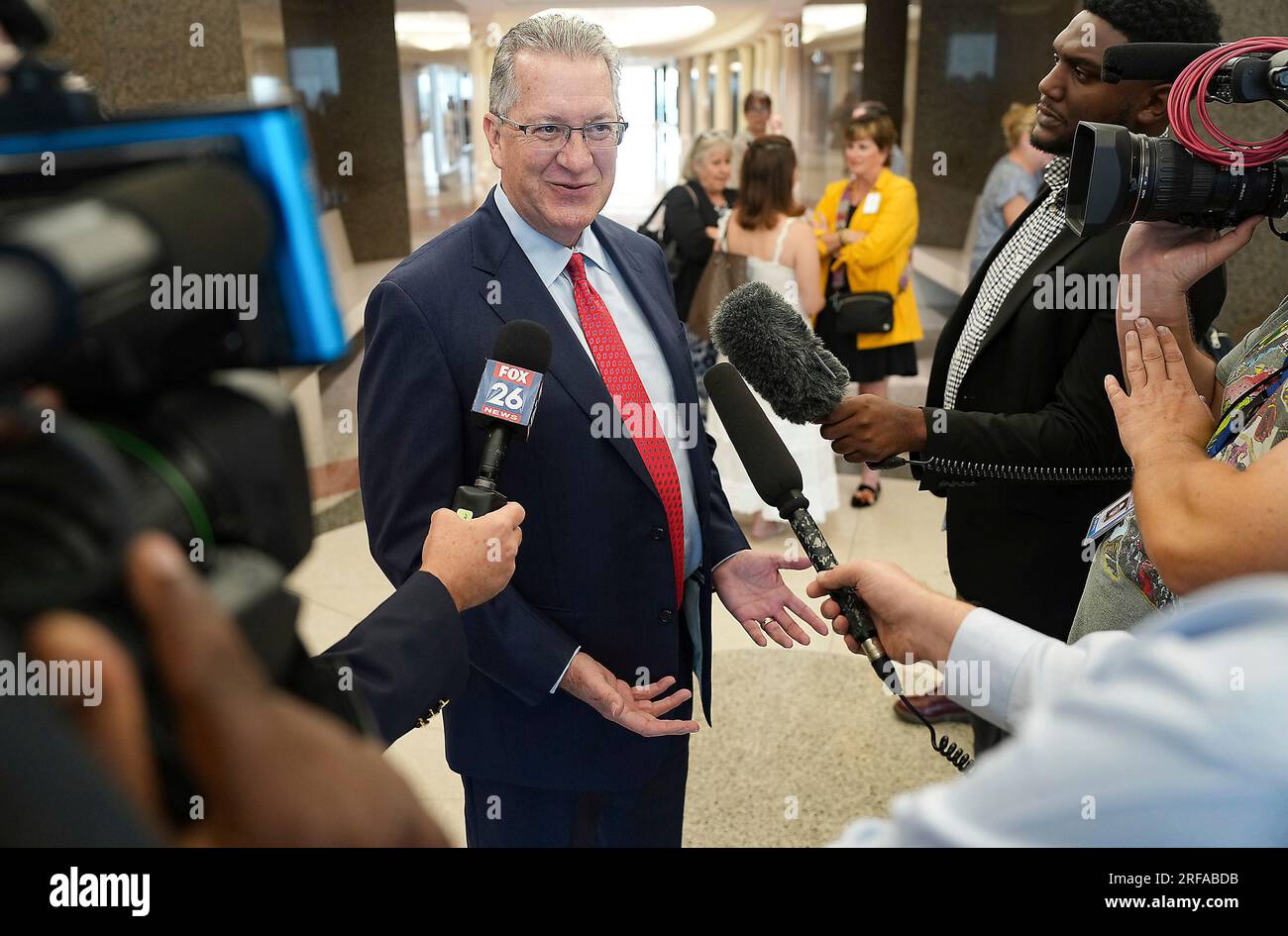 Lawyer Andy Taylor talks to the media during a break on the first day ...