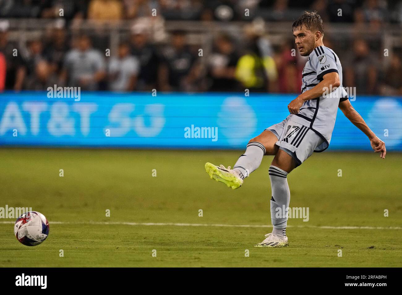 Sporting Kansas City midfielder Jake Davis kicks the ball during the ...