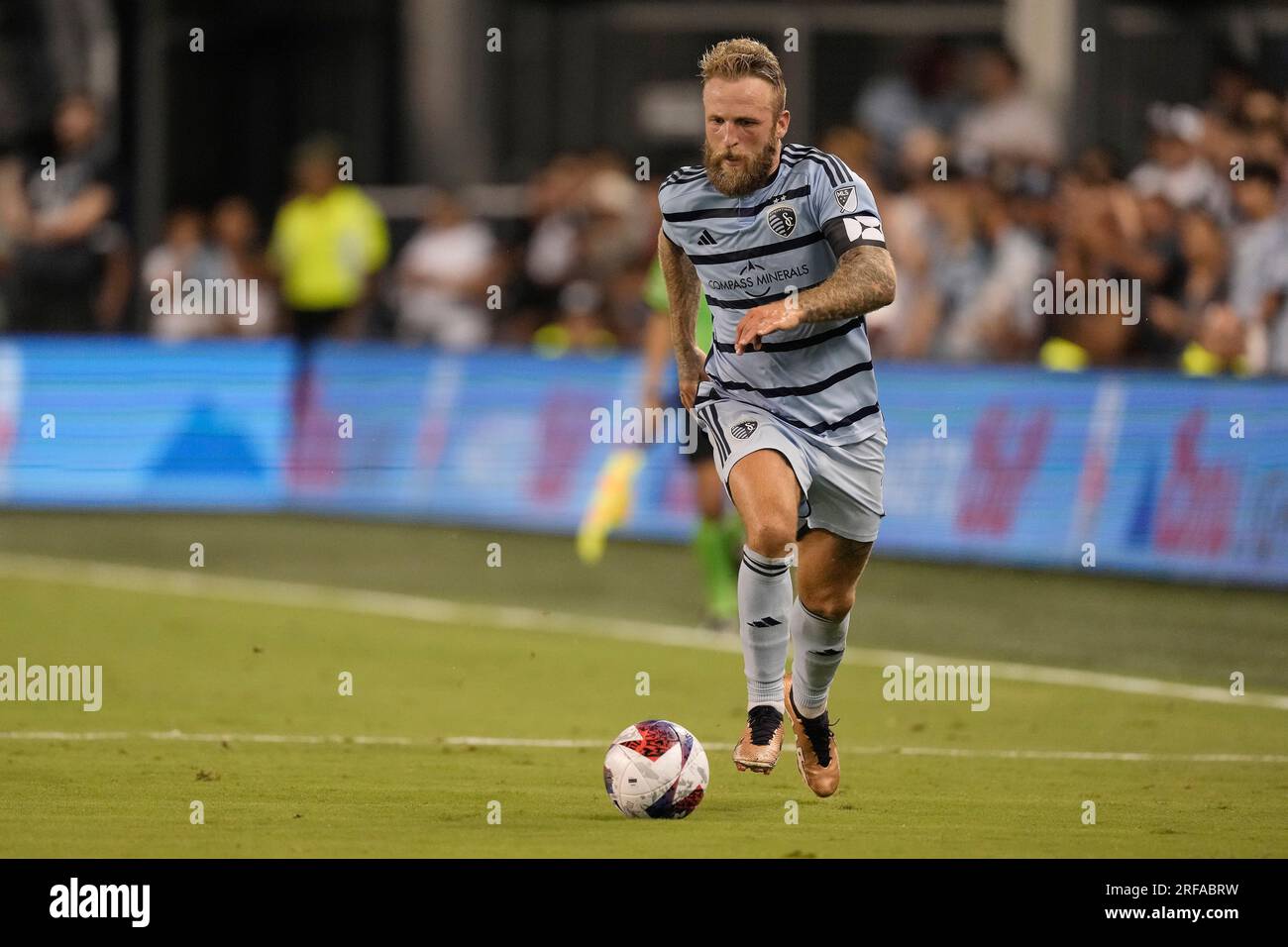 Sporting Kansas City forward Johnny Russell kicks the ball during the ...