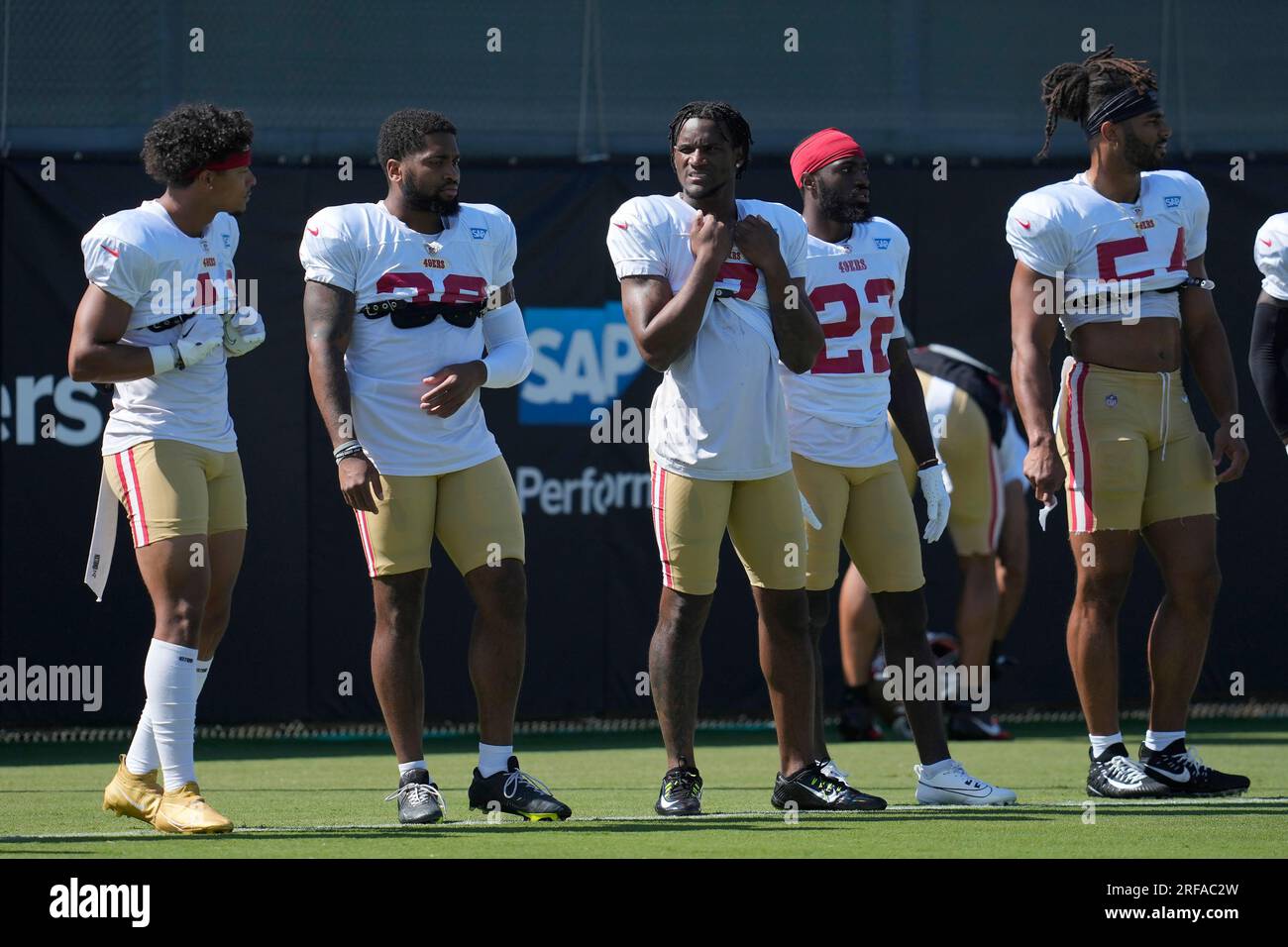 San Francisco 49ers' Tayler Hawkins, from left, Myles Hartsfield ...