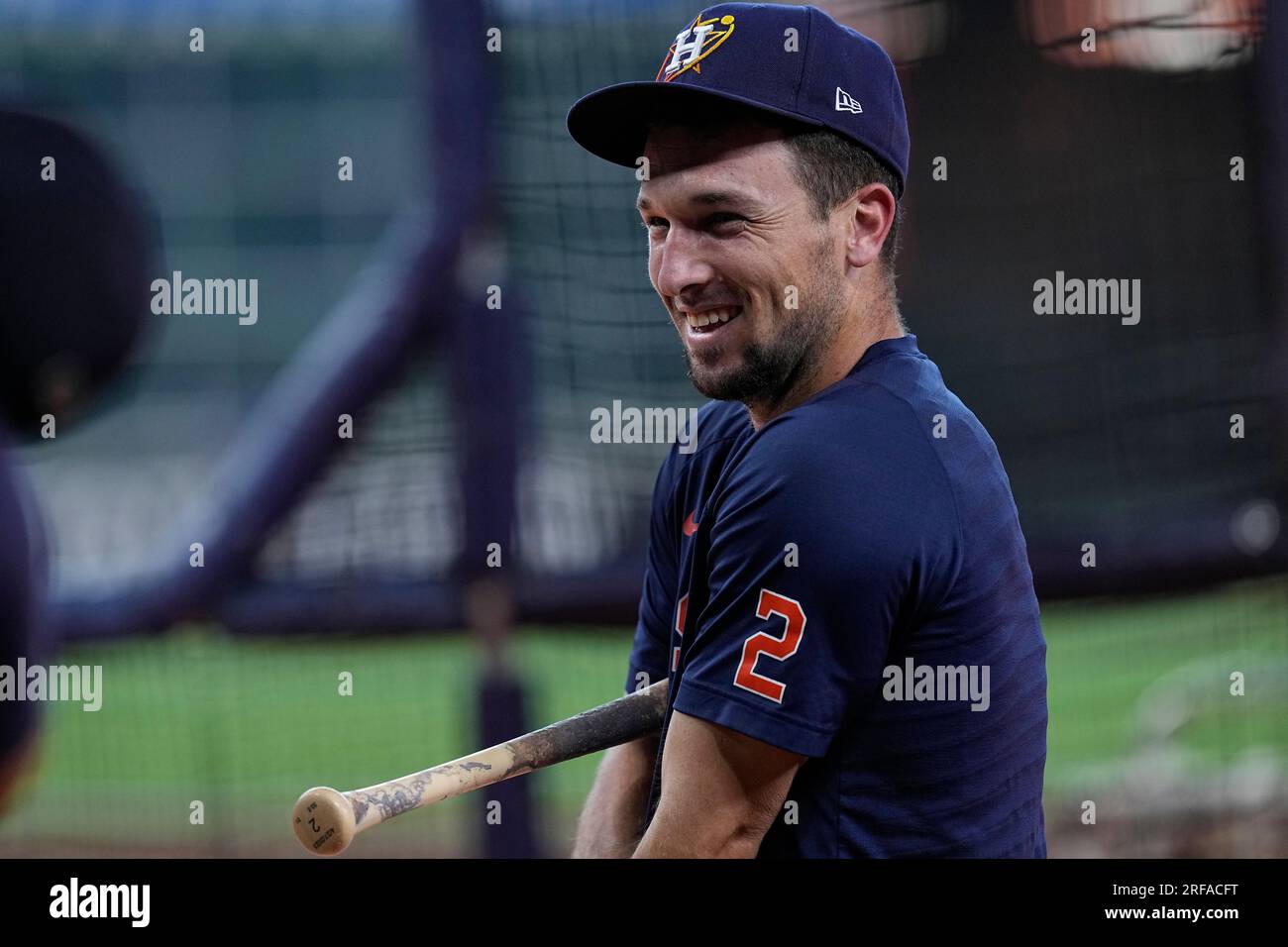 Houston Astros third baseman Alex Bregman walks to the batting cage ...