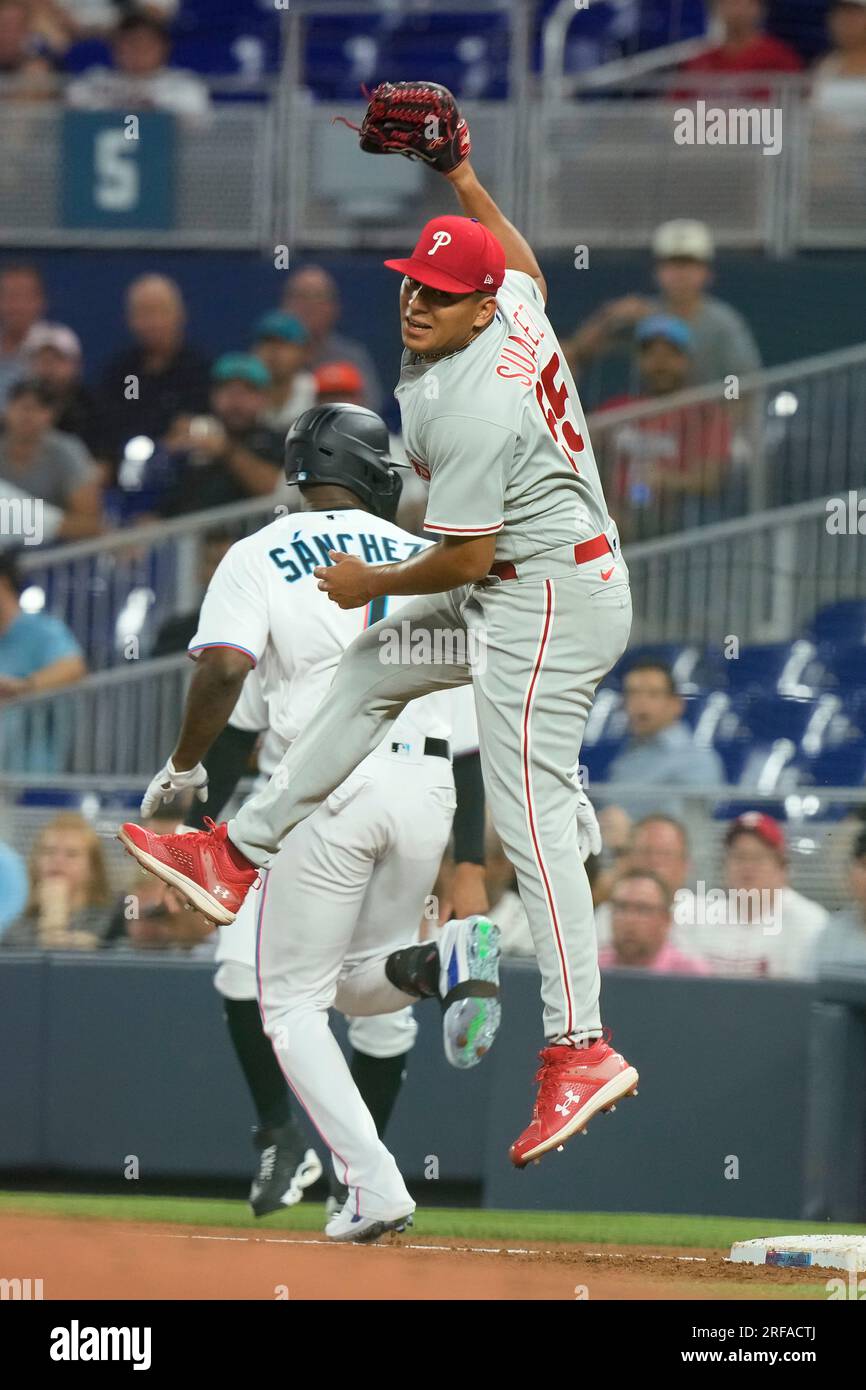 Miami Marlins' Jesus Sanchez (7) beats the tag on first base by ...