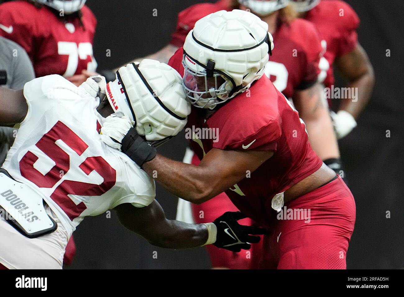 Arizona Cardinals offensive tackle Paris Johnson Jr., right, blocks ... Arizona Cardinals offensive tackle Paris Johnson Jr., right, blocks ...