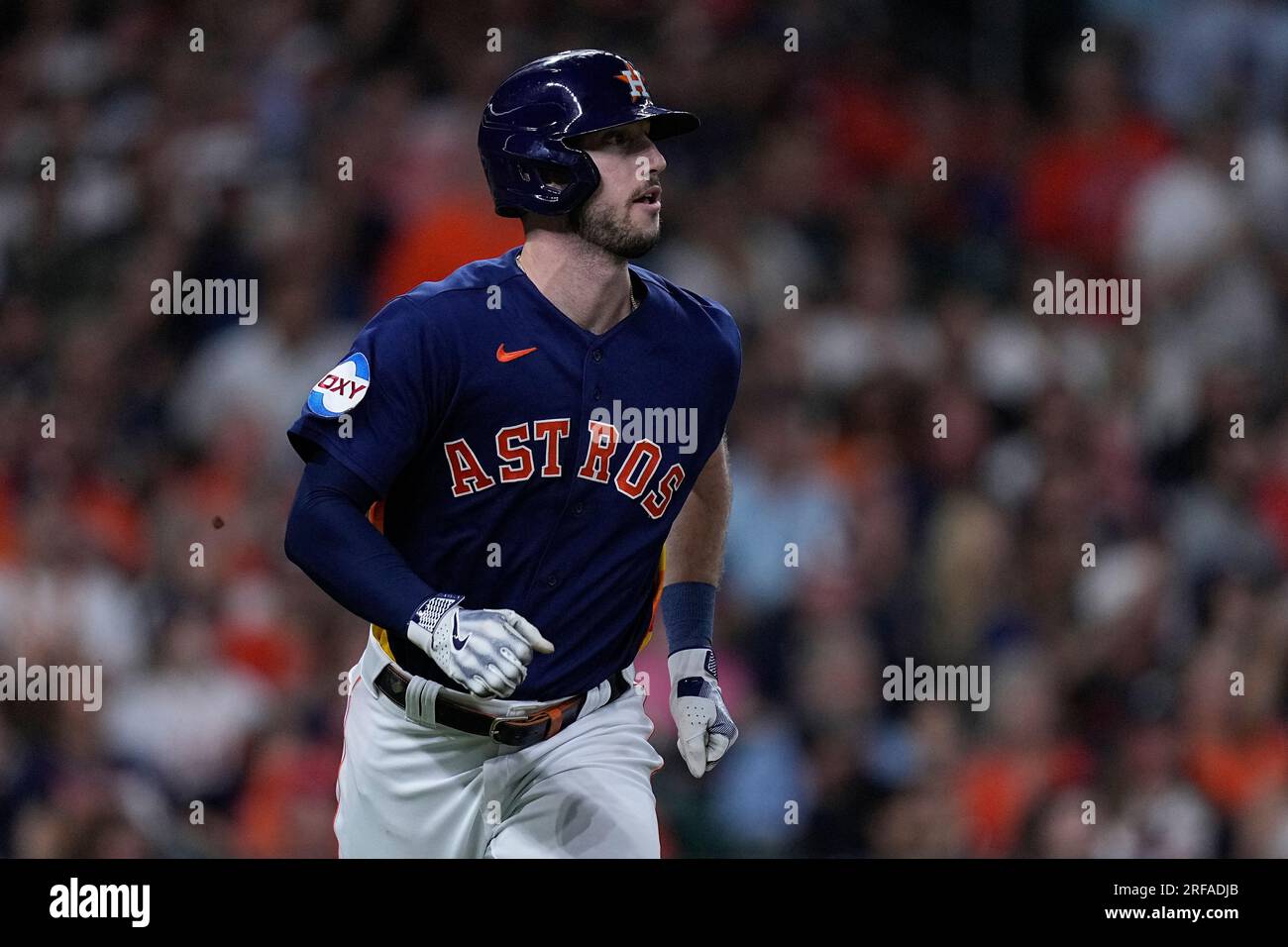 Houston Astros' Kyle Tucker runs to first base after hitting a two-run ...