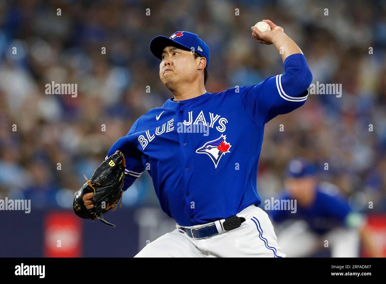 TORONTO, ON - AUGUST 01: Toronto Blue Jays starting pitcher Hyun Jin Ryu (99) throws to the ...